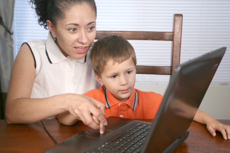 Family on computer stock photo. Image of woman, wireless - 17407084