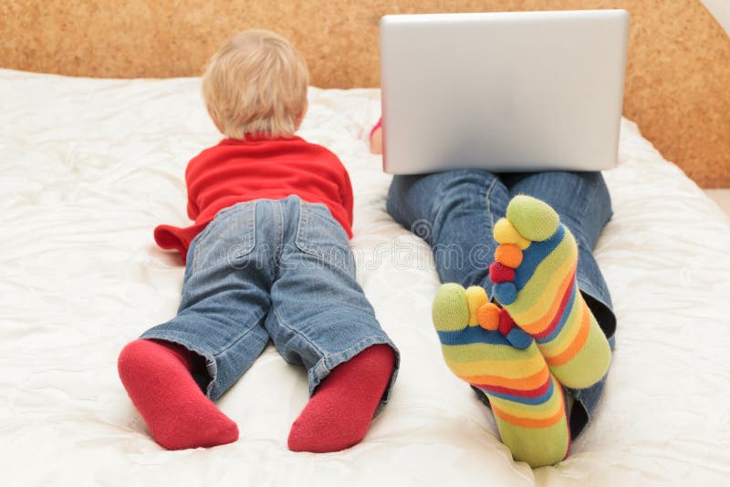 Family with Computer at Home Stock Photo - Image of people, home: 27109974