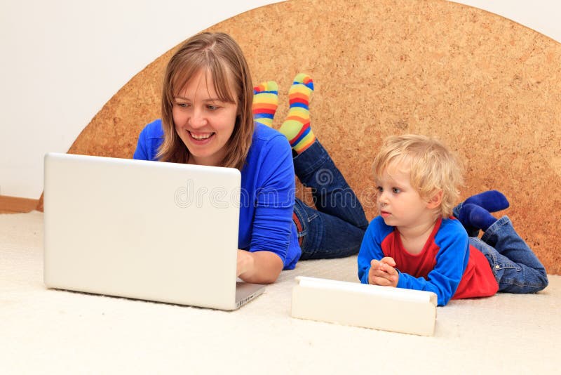 Family with Computer at Home Stock Image - Image of child, home: 27379325
