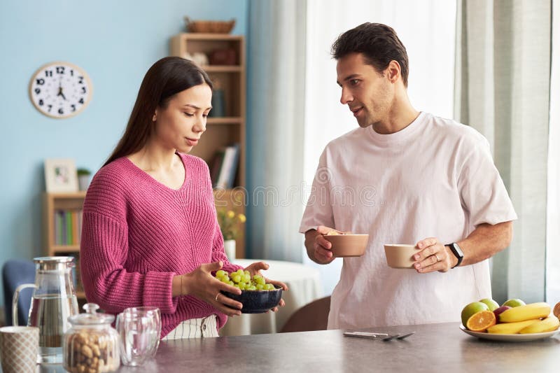 Cooking Breakfast with Fresh Eggs in a Rustic Kitchen. Hands Preparing ...