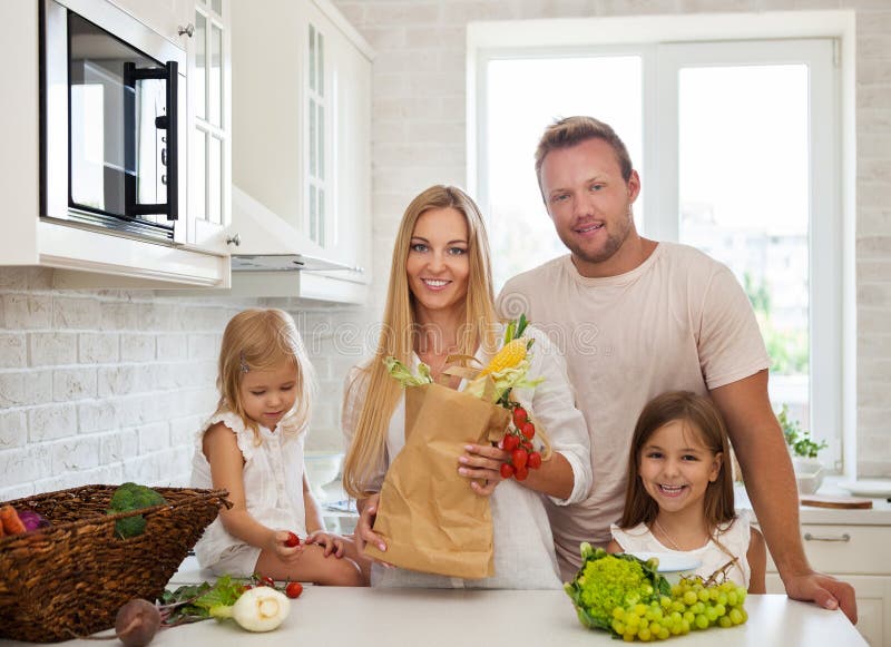 Family Cooking in a Modern Kitchen Setting Stock Image - Image of male ...
