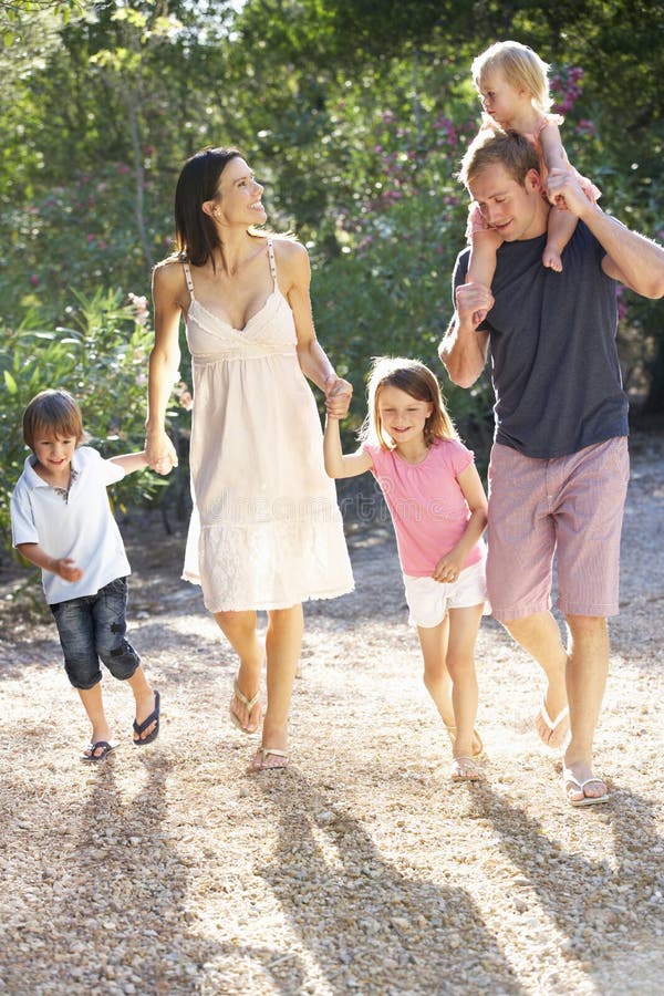 Family on Country Walk Together Stock Photo - Image of male, carrying ...