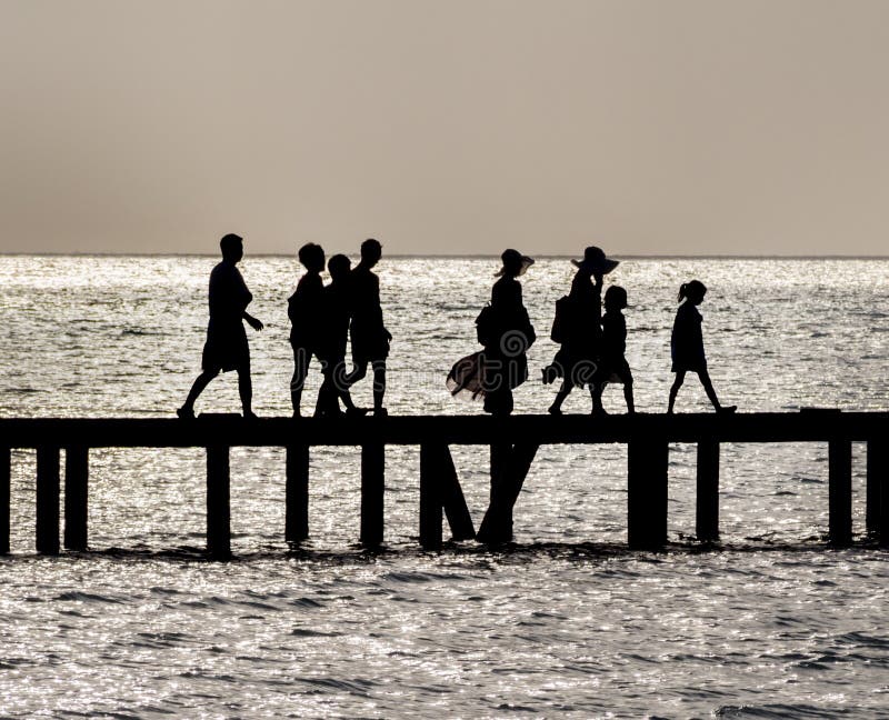 Family crossing bridge stock image. Image of hands, child - 29241169