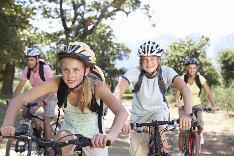 Family Cycling through Countryside Stock Image - Image of girl ...