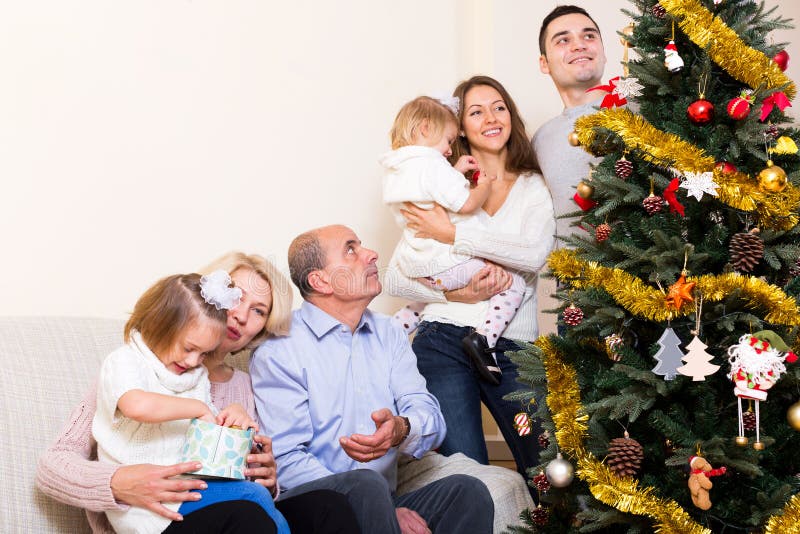 Family with Decorated Christmas Tree Stock Image - Image of posing ...