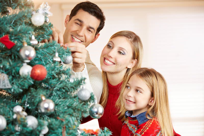 Family Decorating Christmas Tree at Home Stock Image - Image of tree ...