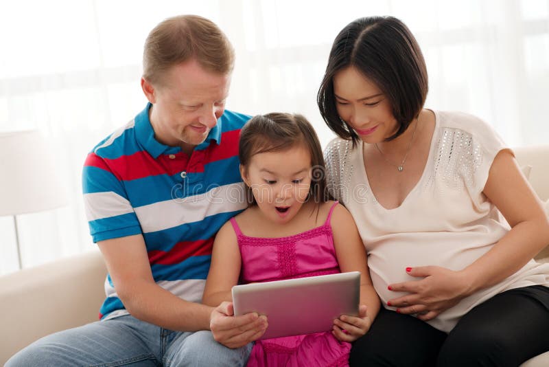 Family with digital tablet stock image. Image of mother - 49285581