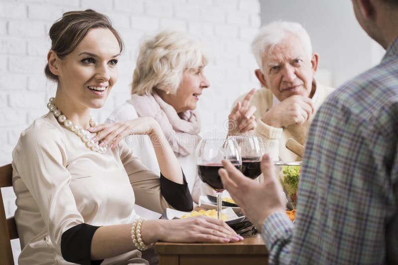 Family Discussing at Dinner Time Stock Image - Image of parents, news ...