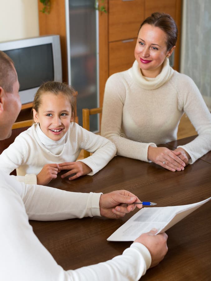 Family with documents stock image. Image of home, custodianship - 49073679