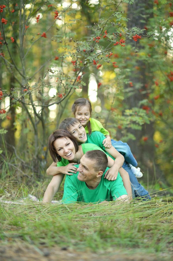Family doing exercises stock image. Image of pleasure - 67342607