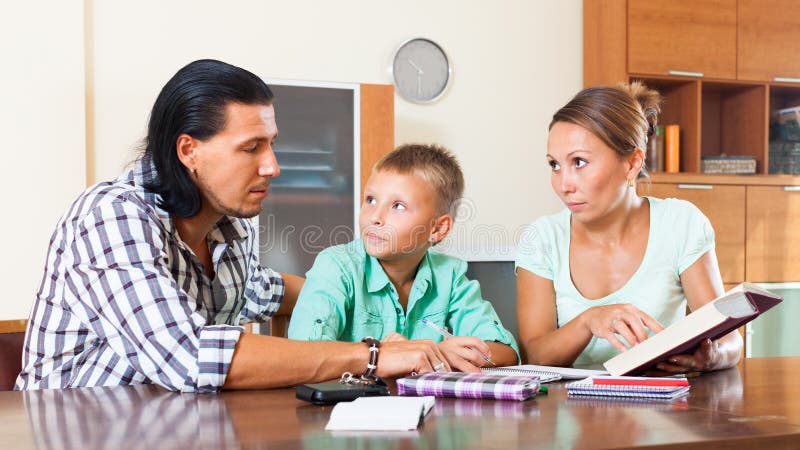 Family Doing Homework in Home Stock Image - Image of girl, help: 37377131
