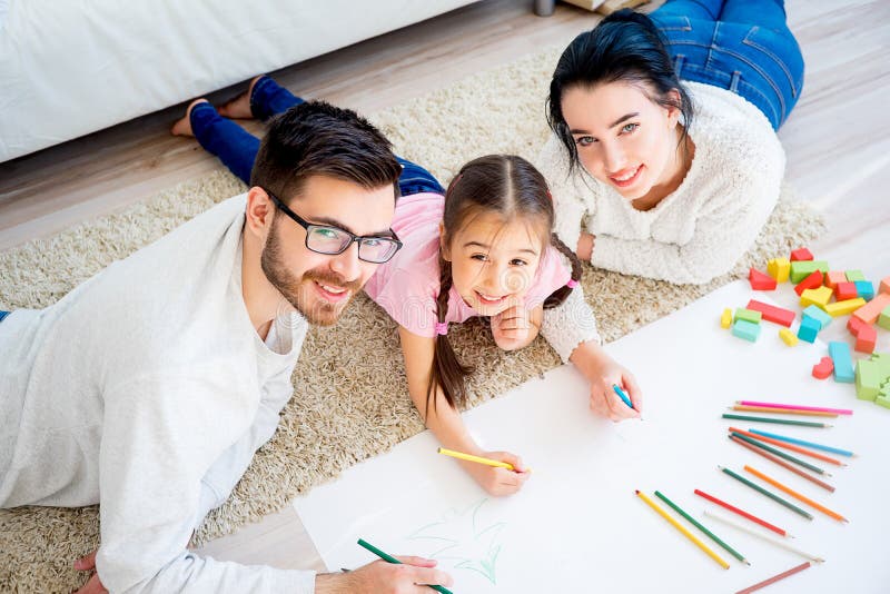 Family drawing together stock photo. Image of joyful - 90942392