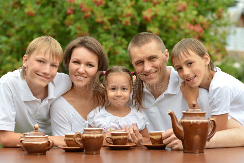 Family Drinking Tea Outdoors Stock Photo - Image of parents, mother ...