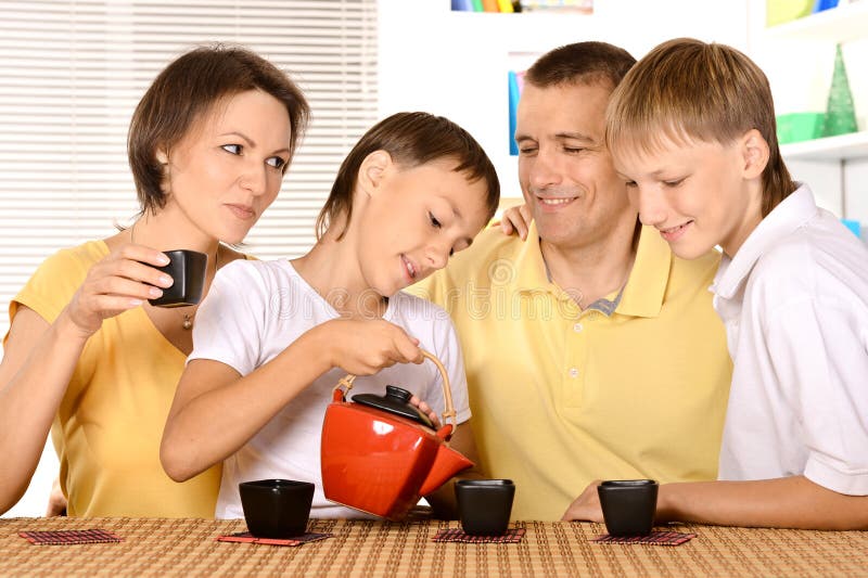 Family drinking tea stock photo. Image of caucasian, kitchen - 51142206