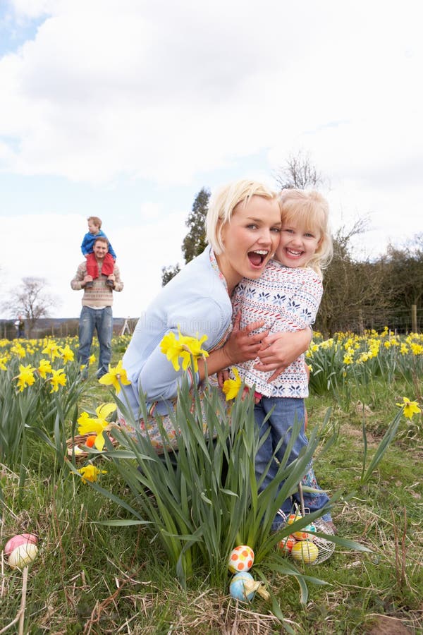 Family Decorating Easter Eggs on Table Outdoors Stock Photo - Image of ...