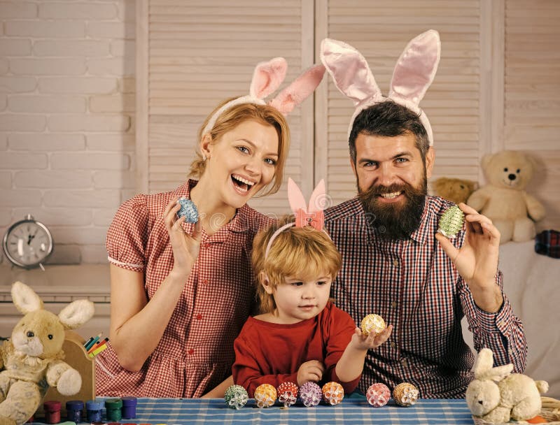 Family with easter eggs stock photo. Image of coloring - 135651118