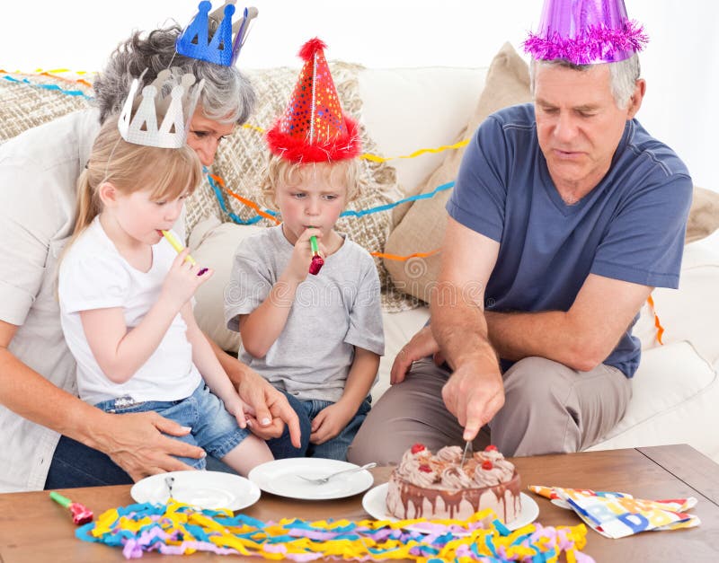 Family Eating the Birthday Cake Together Stock Image - Image of ...