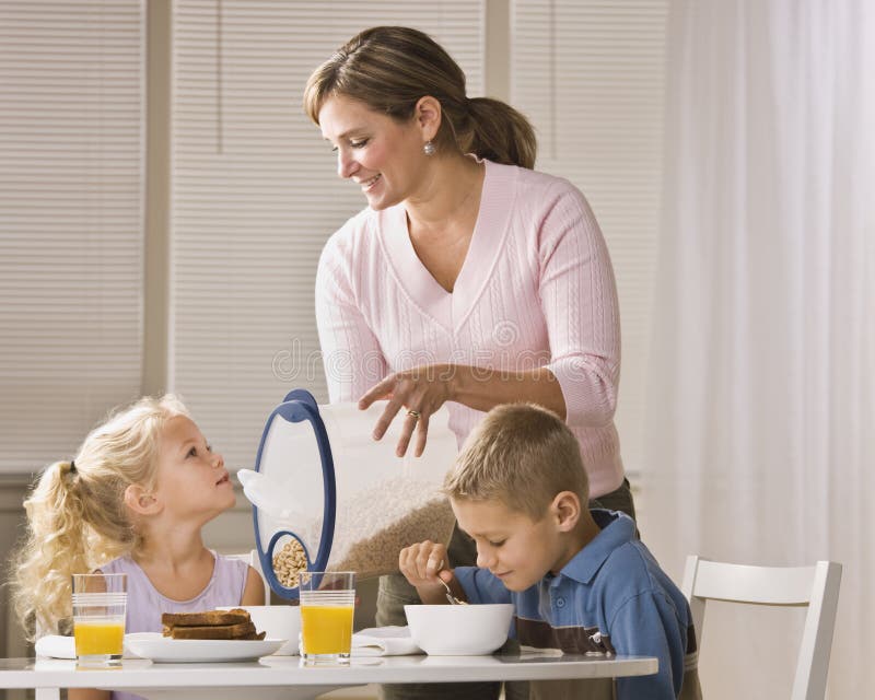 Family Eating Breakfast stock photo. Image of daughter - 10320740