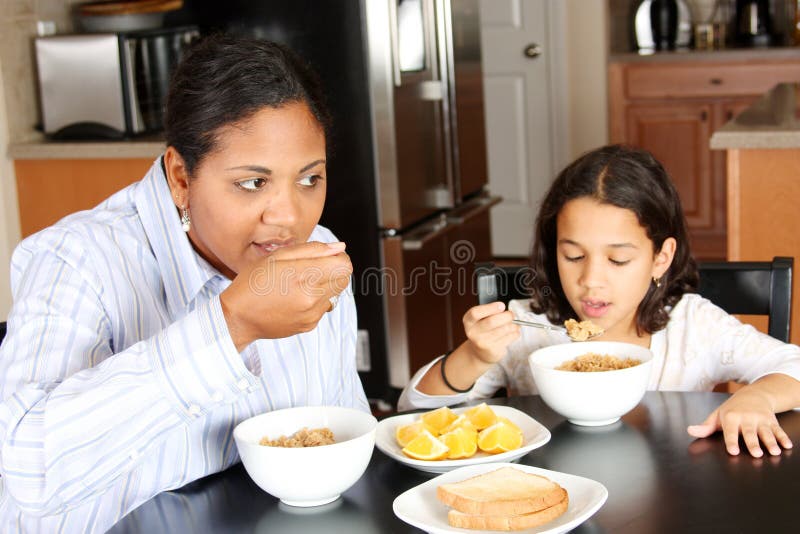 Family Eating Breakfast stock photo. Image of eating, girl - 7312962