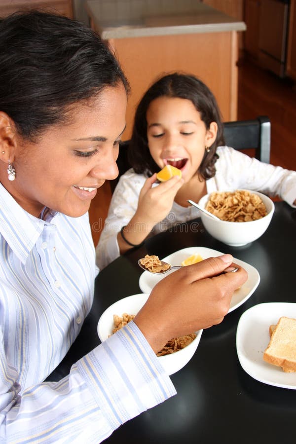 Father Sitting with Daughter at Breakfast Stock Photo - Image of eating ...