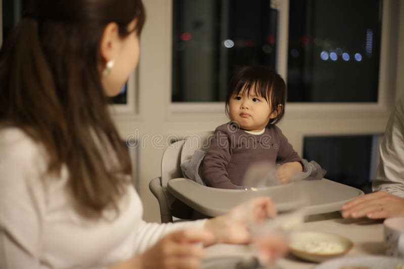 Family eating at home stock image. Image of tasty, woman - 325182483