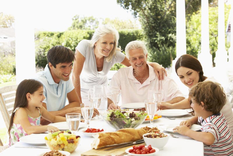 Family Eating Lunch Outside in Garden Stock Image - Image of happy ...