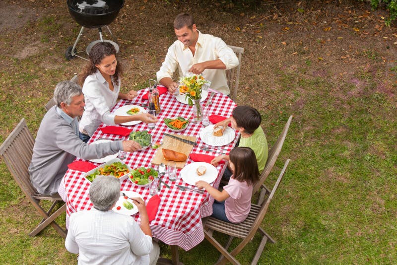 Family Eating Outside in the Garden Stock Image - Image of love ...