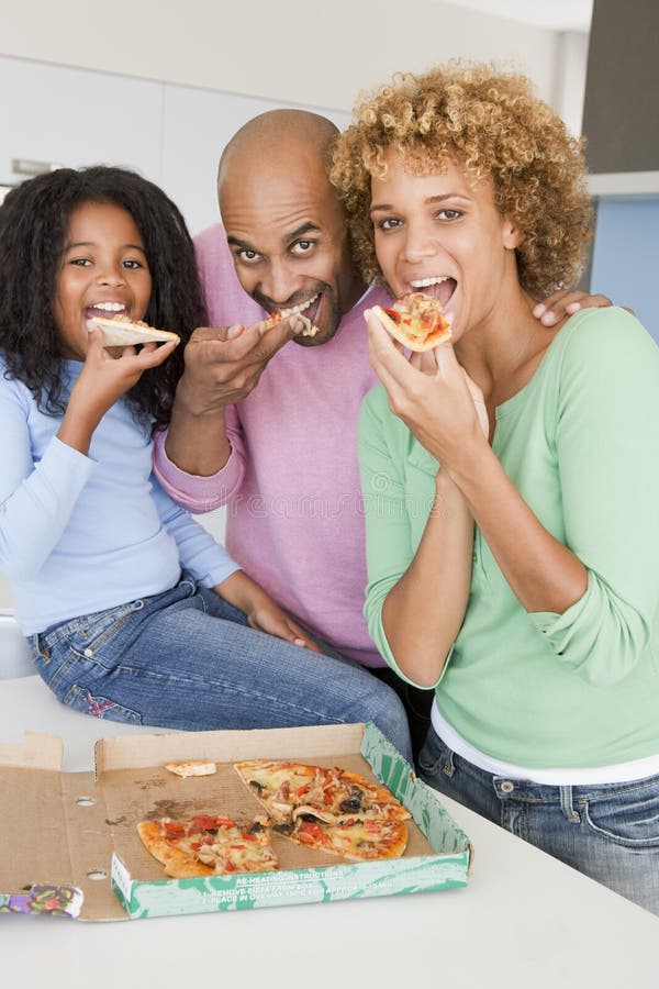 Family Eating Pizza and Fries at Home Stock Image - Image of parent ...