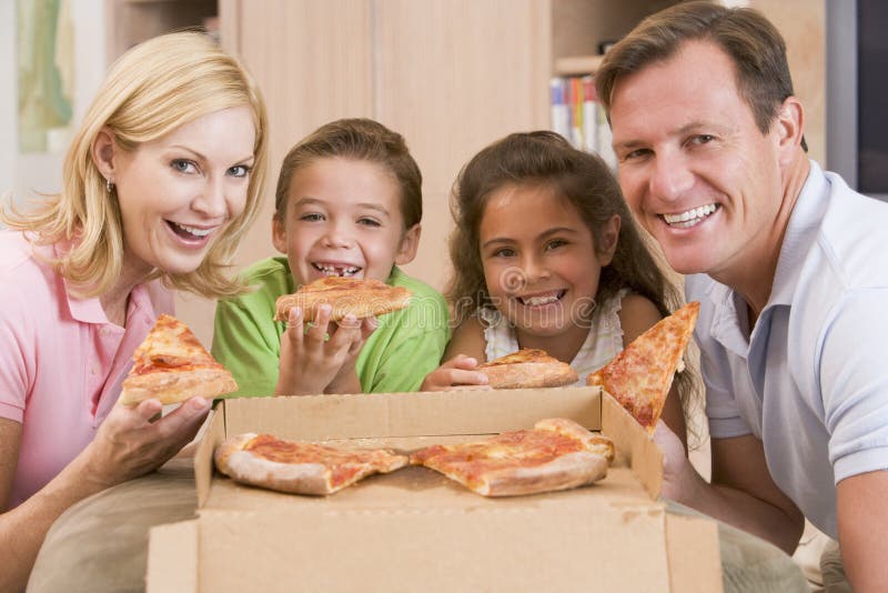 Family Eating Pizza Together Stock Photo - Image of home, father: 6880278