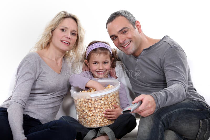 Happy Family Eating Popcorn Watching Television Stock Image - Image of ...