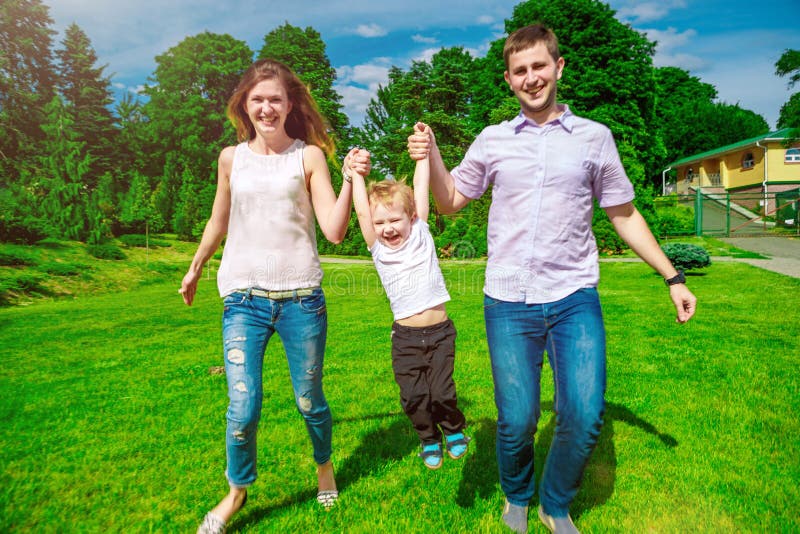 Family - Enjoying the Life Together Stock Image - Image of meadow ... Family - Enjoying the Life Together Stock Image - Image of meadow ...
