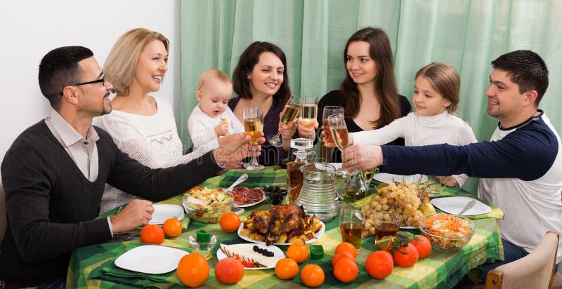 Family event at table stock image. Image of members, father - 69445369