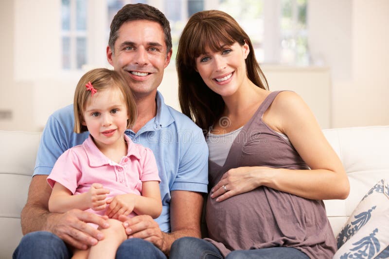 Family expecting new baby stock image. Image of casual - 25390623