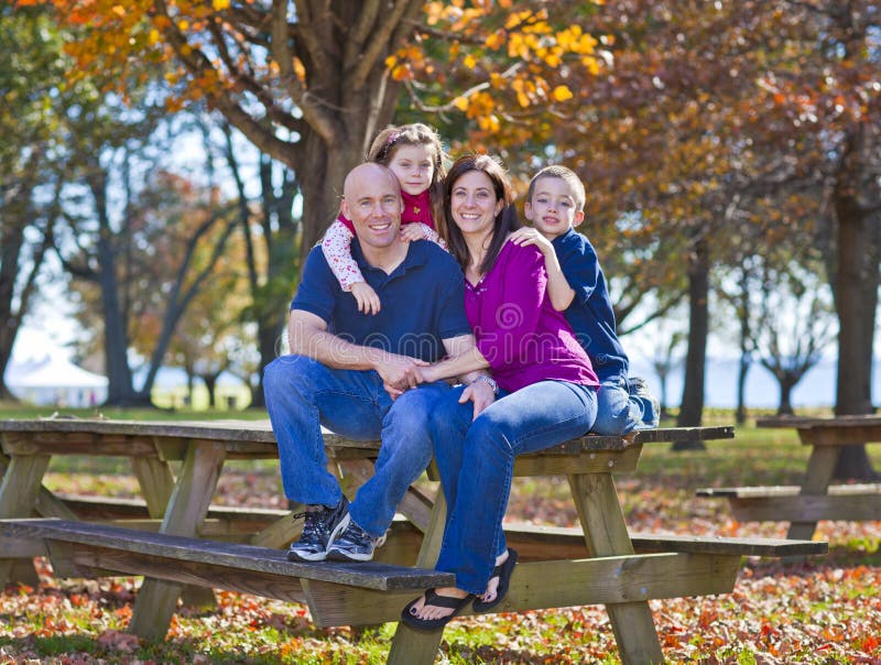 Portrait of Happy Family and Dog Outside in Fall Stock Image - Image of ...