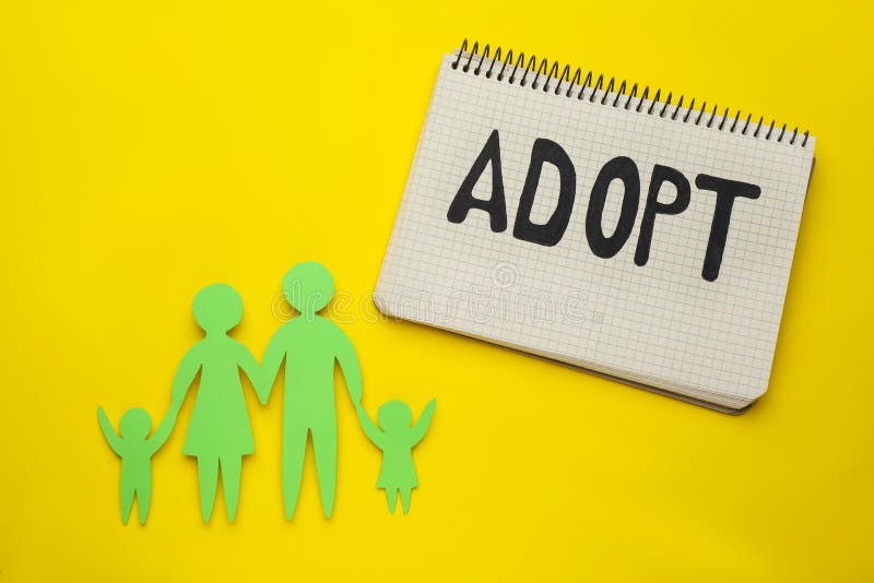 Family Figure and Notebook with Word Adopt on Yellow Background, Flat ...