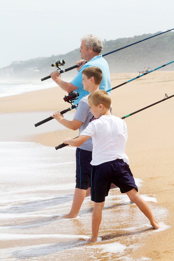 Family fishing on beach stock photo. Image of grandfather - 22168130