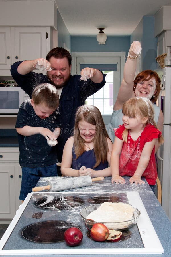 Family Food Fight in Kitchen Stock Photo - Image of girls, cute: 96156562