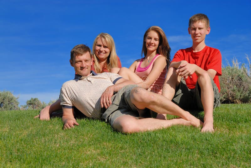 Family of four stock image. Image of smile, brother, siting - 10197869