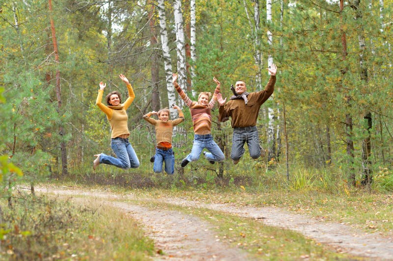 Portrait of Family of Four Having Fun in Autumn Forest Stock Image ...