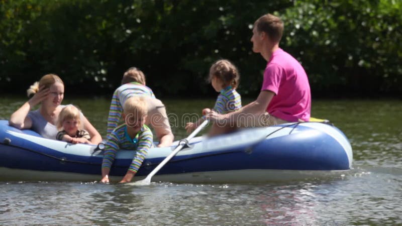 Family with Four Kids in Rubber Boat, Stock Video - Video of childhood ...