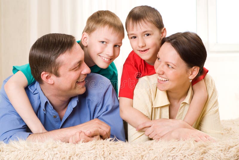 Family four on a light stock image. Image of brothers - 15129271