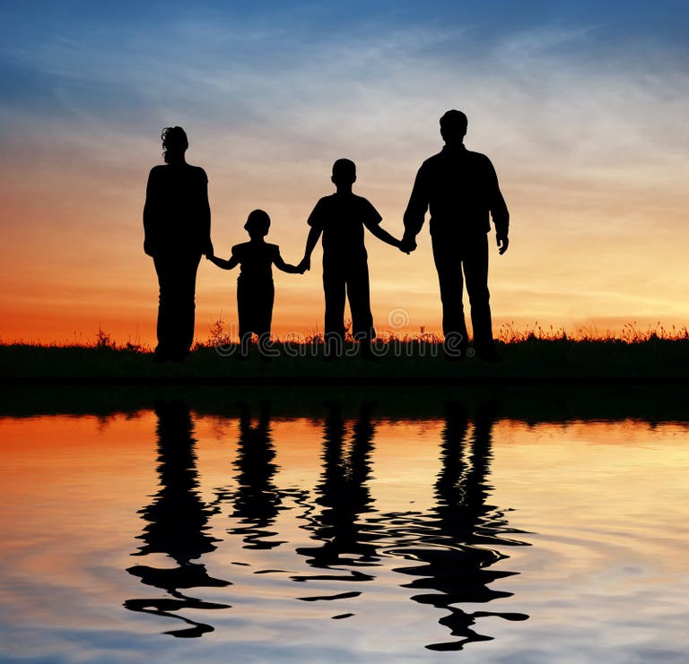 Family of Four on Sunset Sky Stock Photo - Image of little, papa: 4694076