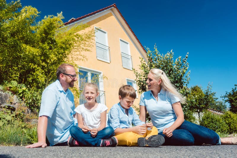 Family in Front of Their Home Stock Image - Image of house, father ...
