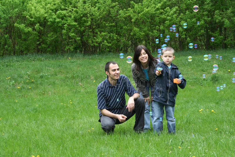 Family fun stock image. Image of activity, childhood, blowing - 5092197