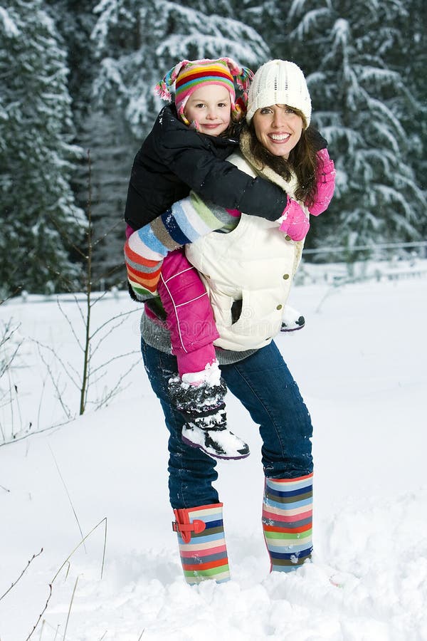 Family in the snow stock photo. Image of happy, child - 18790932