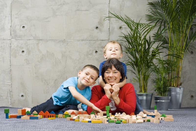 Family Fun with Wooden Blocks Stock Image - Image of play, friendship ...