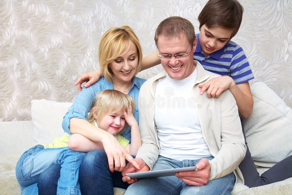 Family with gadgets stock photo. Image of leisure, father - 26800500