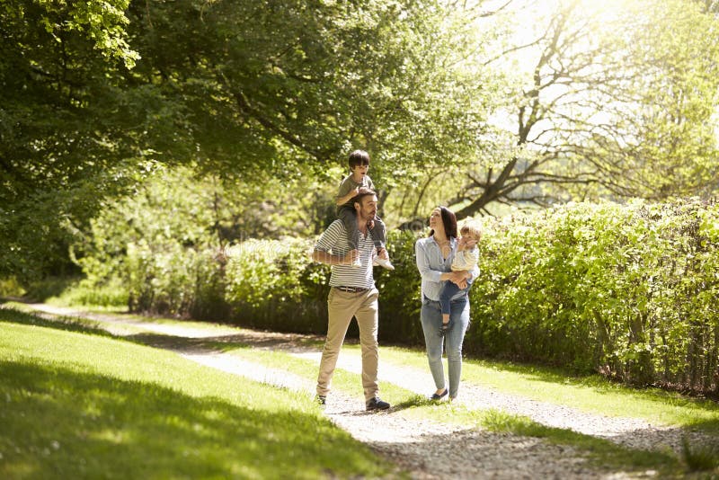 Family Going for Walk in Summer Countryside Stock Image - Image of four ...