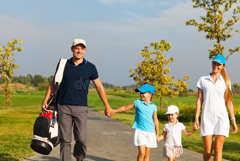 Family of a Golfers at Sunset Stock Photo - Image of game, couple: 44793726