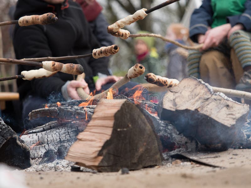 Family Grilling Bread on a Stick Stock Image - Image of cooking, picnic ...